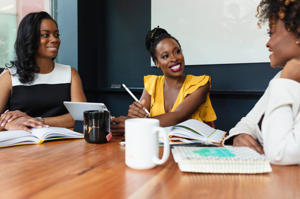 Black businesswomen in leadership meeting - Creative Flame Media